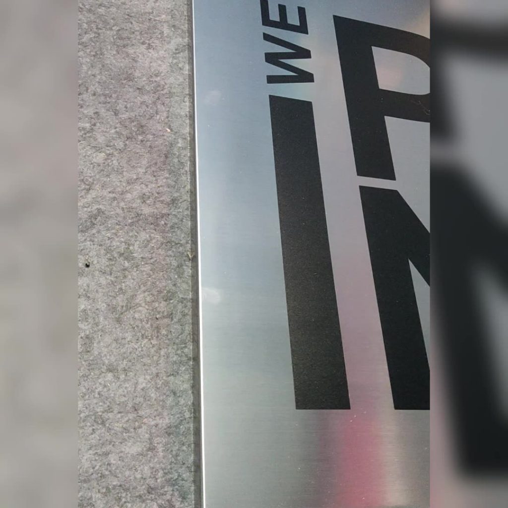 Brushed metal stainless steel signboard