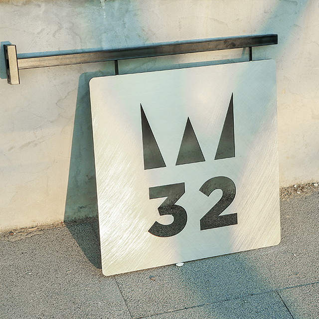 Custom metal frame shop signs