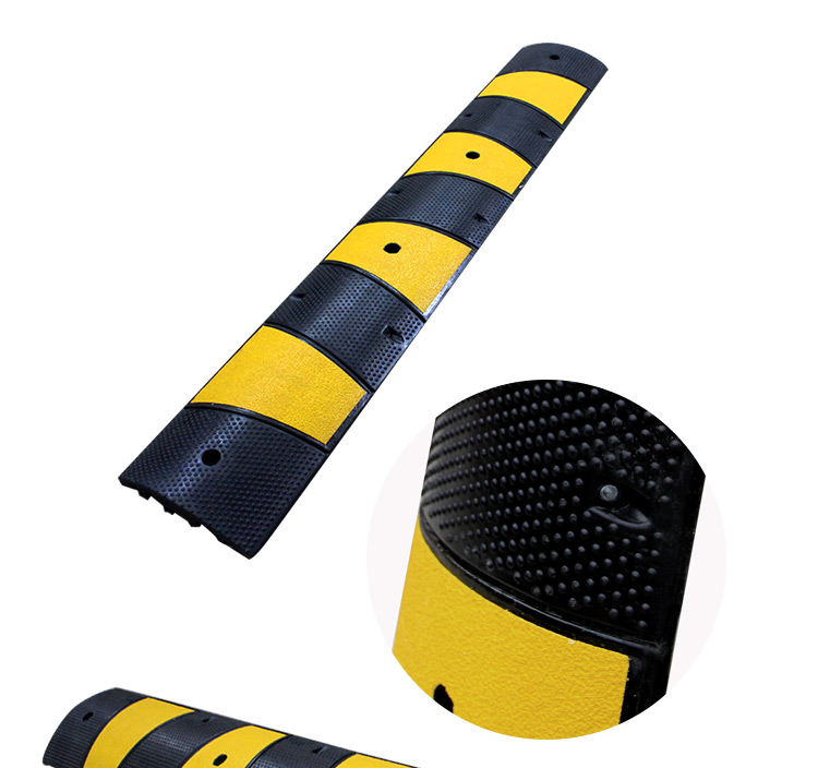 Extended rubber road speed bump