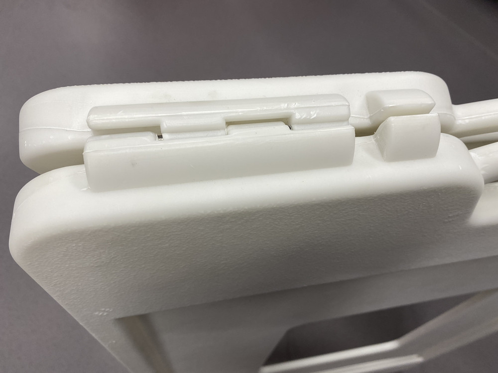 Off-white plastic outdoor sign stand