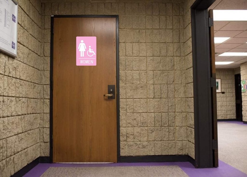 Pink female handicapped handicap sign