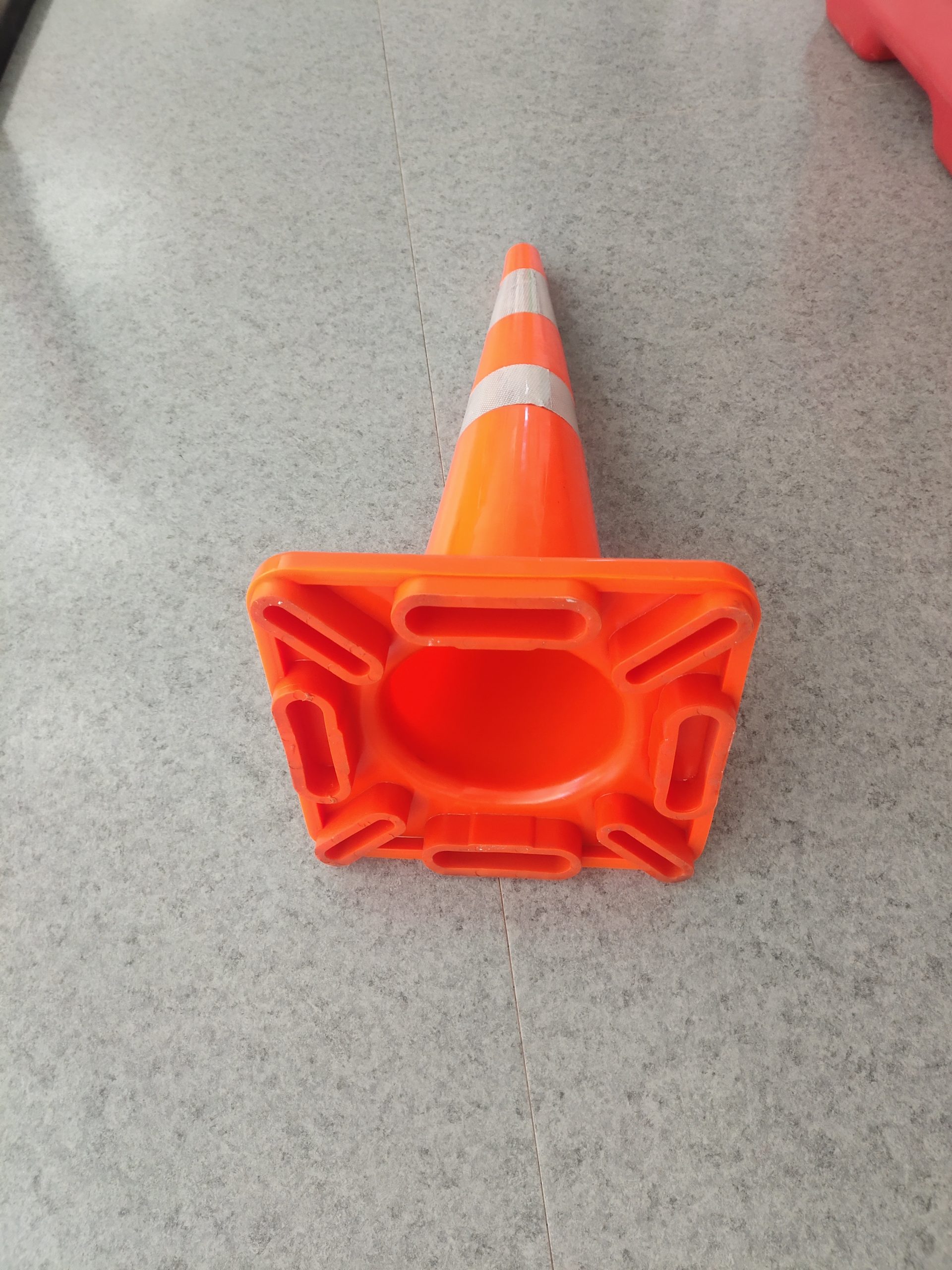 Red conspicuous standard traffic cone