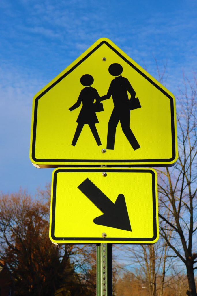 Yellow community road school road sign